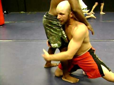 Double leg takedown en MMA